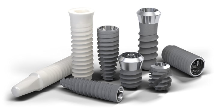 Dental implant materials and surfaces